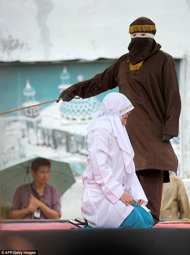 Photos Muslim Lady Mercilessly Flogged And Given 23 Strokes Of Cane For Standing Too Close To